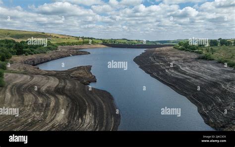 The Reservoir Banks Are Exposed As Water Is Severally Depleted At