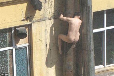 Forget Your Clothes Sir Naked Man Shins Down Drainpipe As Police Raid Brothel