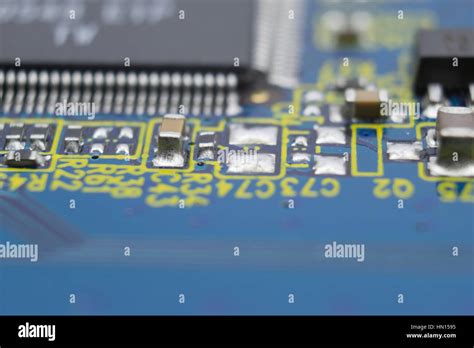 Close Up Of Printed Circuit Board With Big Microchip And Other Components Stock Photo Alamy