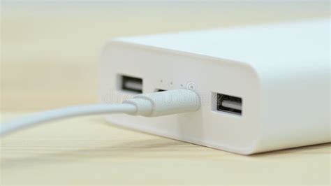 connecting and unplugging usb type c cable to power bank stock video