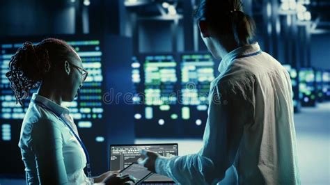 workers coding in data center stock video video of equipment asian