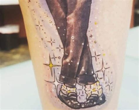 Prince Jacksons Tattoo On His Calf Is A Winged Figure Of His Father