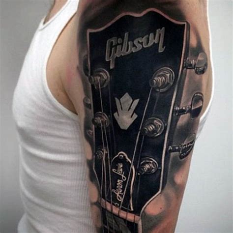 The Meaning Of The Tattoo Guitar History Facts Photo Drawings Sketches