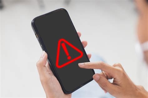 Premium Photo Woman Using Smartphone With Notification Error Warning Sign Over On Mobile Phone