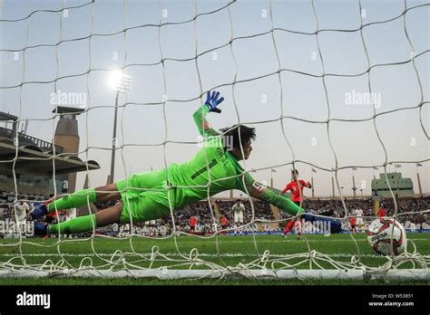 Hwang Ui Jo Of South Korea National Football Team Shots The Ball Against Yan Junling Of China