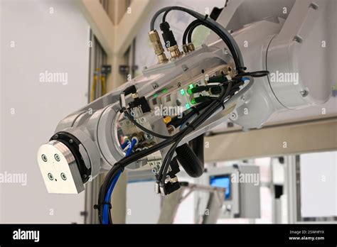 Close Up Of A Robotic Arm Demonstrating Advanced Technology In A Modern Industrial Setting Stock