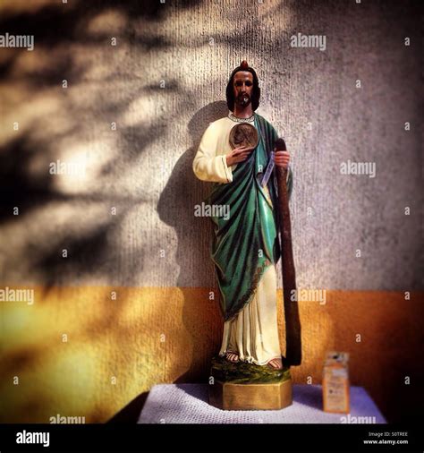 A Sculpture Of Saint Jude Thaddeus Decorates A Street In Colonia Roma