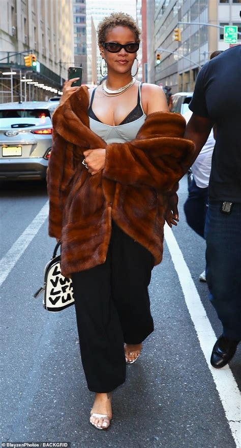 Rihanna Makes The Rare Move Of Wearing Her Natural Hair Out In Nyc