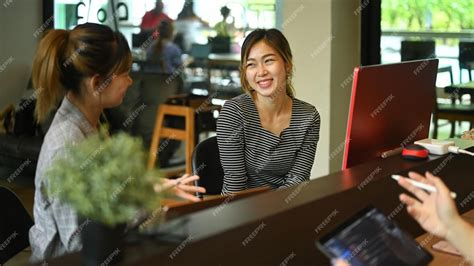 Premium Photo Group Of Young Software Developers Or Coders Brainstorming And Working Together