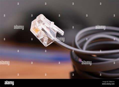 Close Up Shot Of A Telephone Cable With Socket Analog Data Transmit