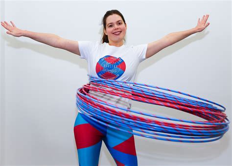 Katie Guinness World Record Most Hula Hoops Spun Simultaneously By A Team — Happy Healthy Hoops