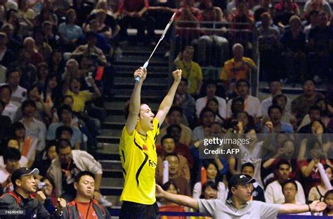 Chinese Badminton Player Cai Yun Celebrates Winning The Mens Doubles