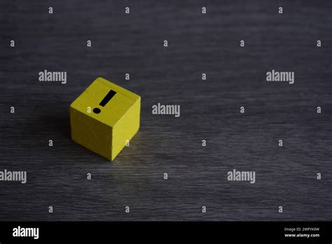 Yellow Wooden Cube On Table With Exclamation Mark Icon Copy Space For