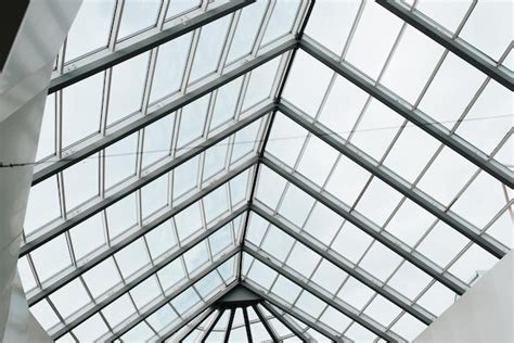 Premium Photo Glass Roof Construction With Metal Structure Indoors