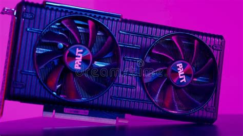 Powerful Modern Gpu Video Card With Two Fans Close Up In Neon Light