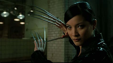 Download Lady Deathstrike In An Epic Combat Pose Wallpaper