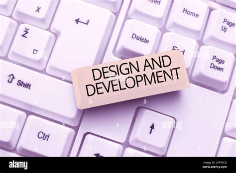 Sign Displaying Design And Development Word Written On Defining The