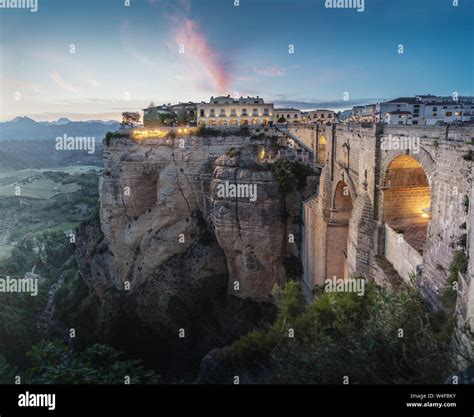 Aerial View Of Tajo Gorge And Ronda Puente Nuevo Bridge At Sunset
