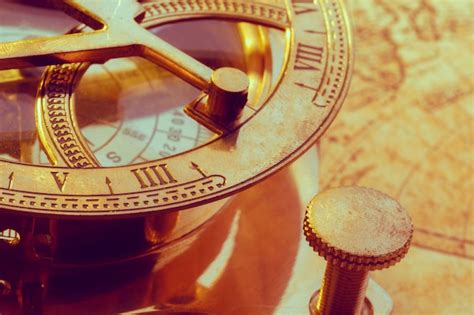 Premium Photo Old Compass Over Ancient Map