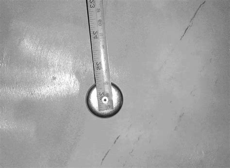 closer view of linear defects on the outside surface of a conical