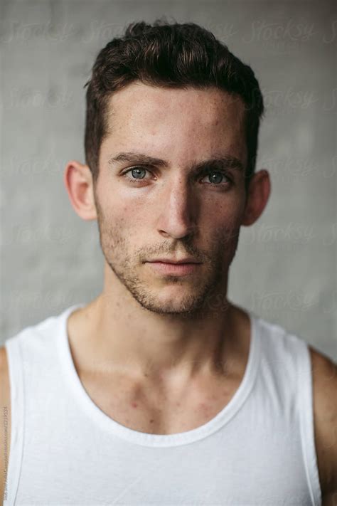 Young Healthy Man Looking At Camera After Working Out In Gym By