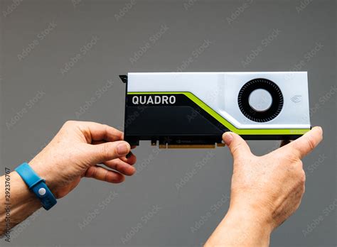 Paris, France - Mar 28 2019: Senior man showing latest Nvidia Quadro ...