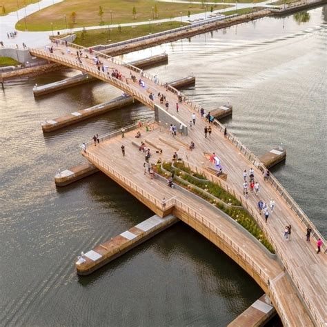 Curved Pedestrian Bridge Links Two Riverfront Parks In Providence