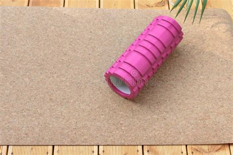 Home Rehabilitation With A Back Massage Roller Pink Roller On A Yoga