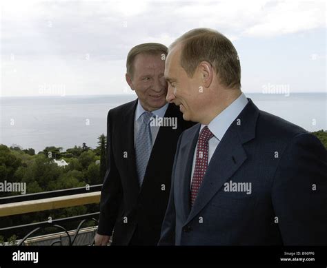 Presidents Vladimir Putin Of Russia Left And Leonid Kuchma Of Ukraine