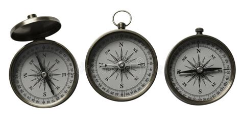 Three Vintage Style Compasses Against A White Background Stock Image