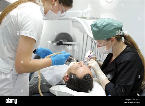 Pulling Tooth Extracting Teeth In Dentistry Middle Aged Mom Two Women