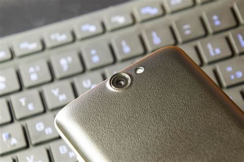 Premium Photo Close Up Of Mobile Phone On Keyboard