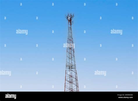 Internet Signal Tower Or Mobile Phone Signal Tower Is Isolated On Blue