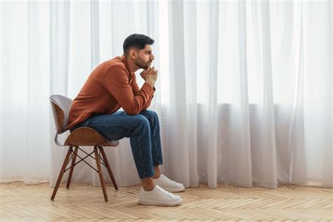 depressed man sitting over 102 240 royalty free licensable stock