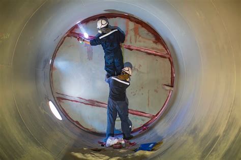Premium Photo Working Male Two Inspection Weld Pt Test Weldment For