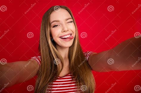 Photo Of Tricky Cunning Girl Wear Striped Top Stick Out Winking Tacking