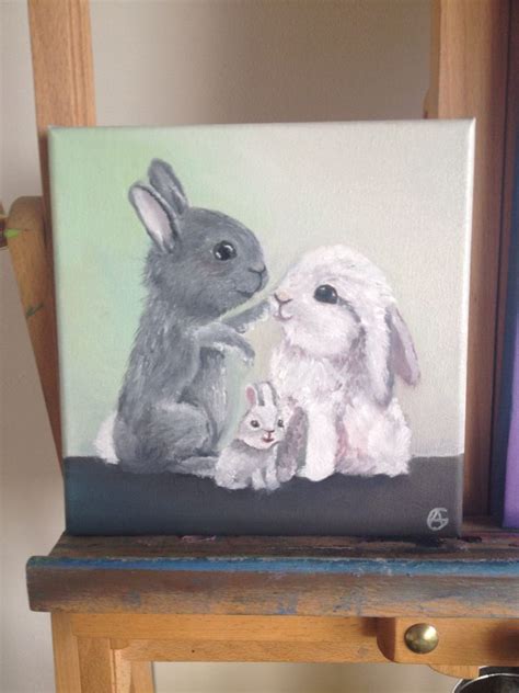 Pintura De Dos Conejos En Una Estantería