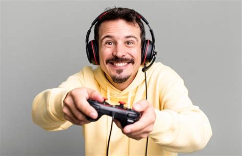 Premium Photo Adult Man Gamer With Headset And A Control Concept