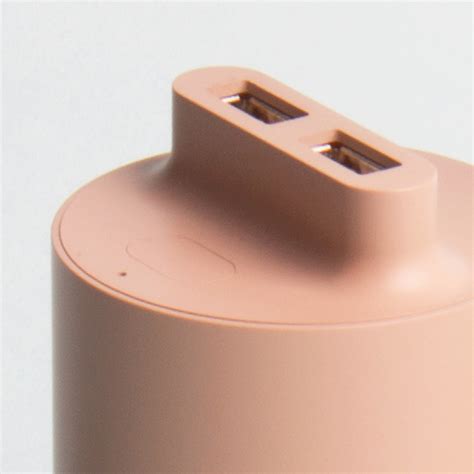 Wireless Charging Island Combines Wooden Elements With Power Pads