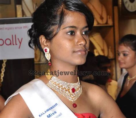 Model With Ruby Diamond Heavy Set Jewellery Designs