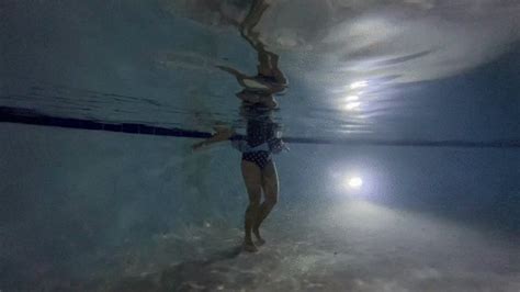 Carissa In An Esther Williams Bathing Suit And Classic Oval Mask