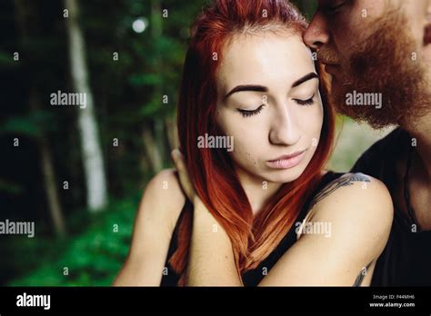 Guy Hugging His Girlfriend Stock Photo Alamy