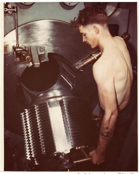 Fire Controlman First Class Emsmith Opening The Breech Of One Of Uss