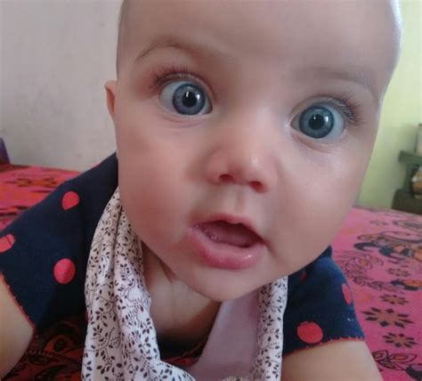 Premium Photo Close Up Of Cute Girl On Bed At Home