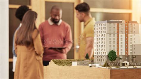 Architecture Team Tablet And City Model In Office For Construction