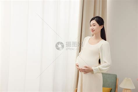 手捧孕肚的孕晚期妈妈高清图片下载 正版图片507723719 摄图网