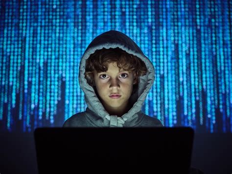 Premium Photo Hacker Looking At Camera At Computer