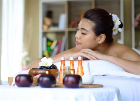 Premium Photo Young Woman Lying Down On Massage Table