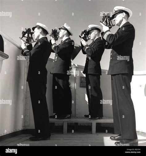 1960s At Sea Four Ships Officers Using Sextants Navigation