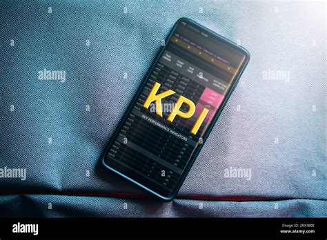 Top View Photo Of Smartphone With Kpi Interface On Screen And Copy